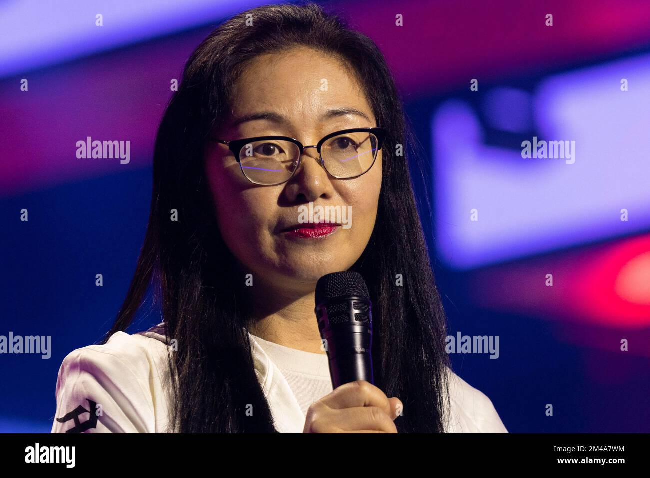 A woman identified only as "Nicole" agitates against the CCP (Chinese ...