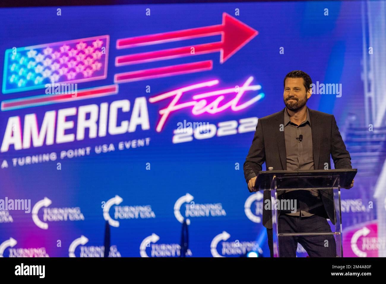 Phoenix, USA. 19th Dec, 2022. Satirist Seth Dillon attacks what he ...
