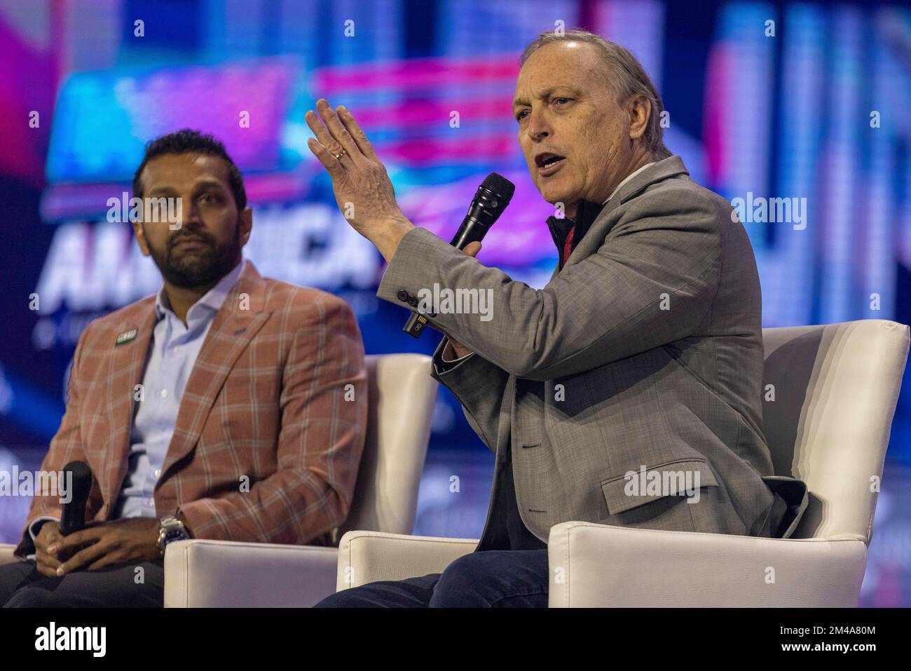 A panel with (L-R) Darren Beattie, Kash Patel, and Andy Biggs ...