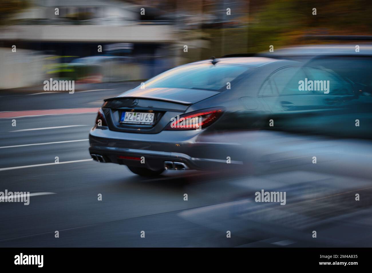 A back view of Mercedes during movement Stock Photo - Alamy