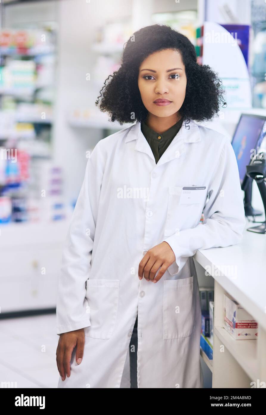 Im an important member of the healthcare team. a pharmacist at work Stock Photo - Alamy