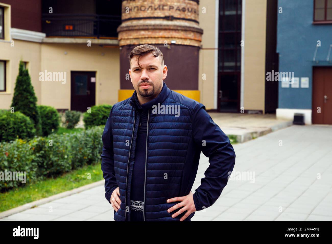 European caucasian white young male man with goatee beard looking at ...