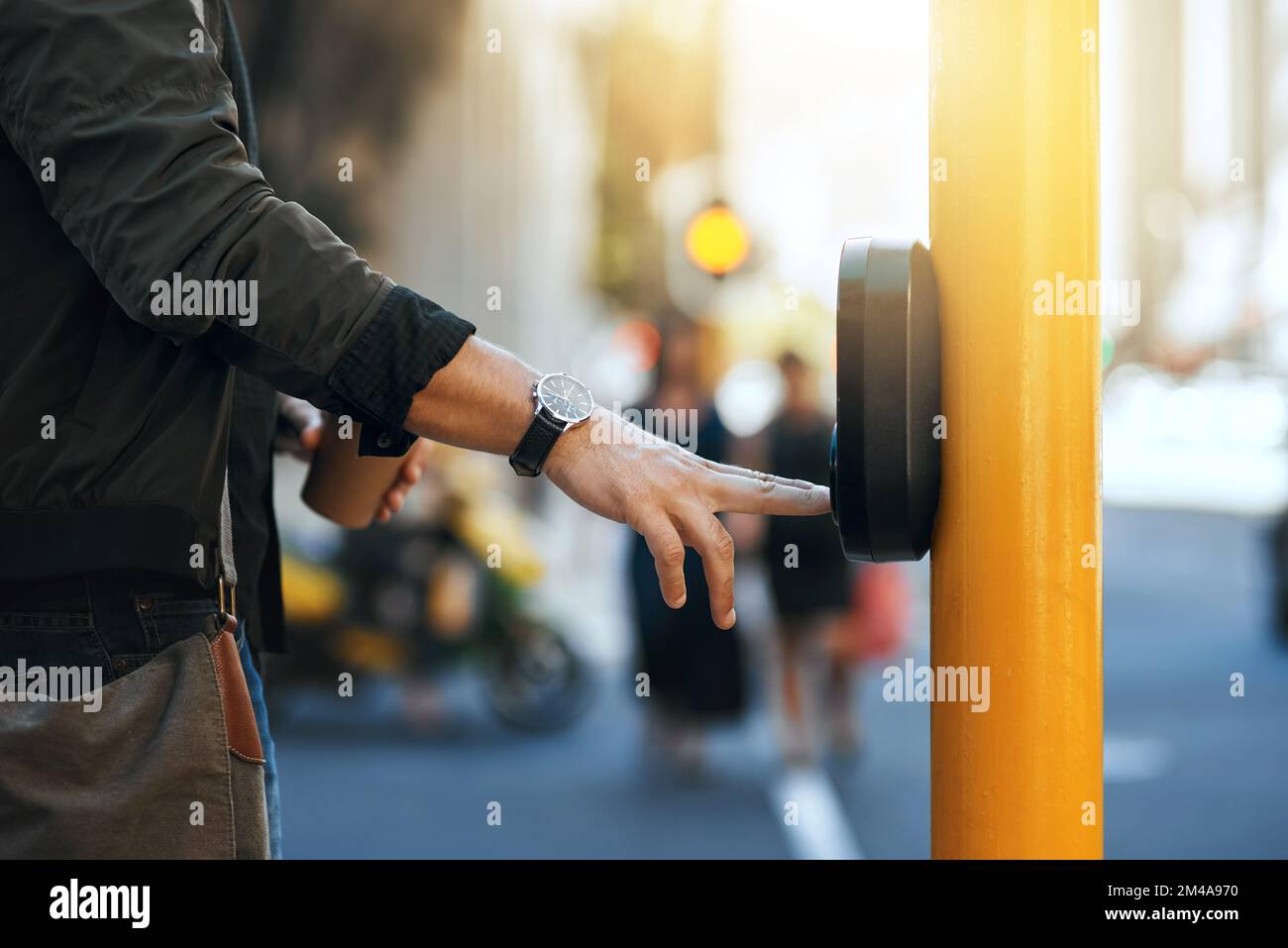 Hell wait until the light changes. an unrecognizable man pressing the ...