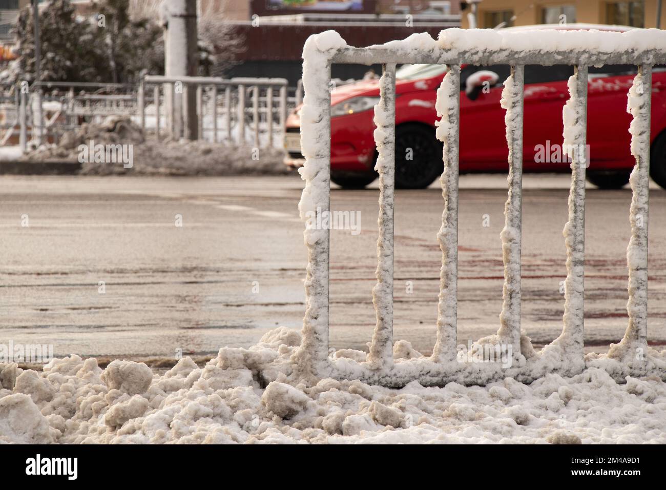 frozen snow from ice on a city street in winter in Ukraine Stock Photo ...