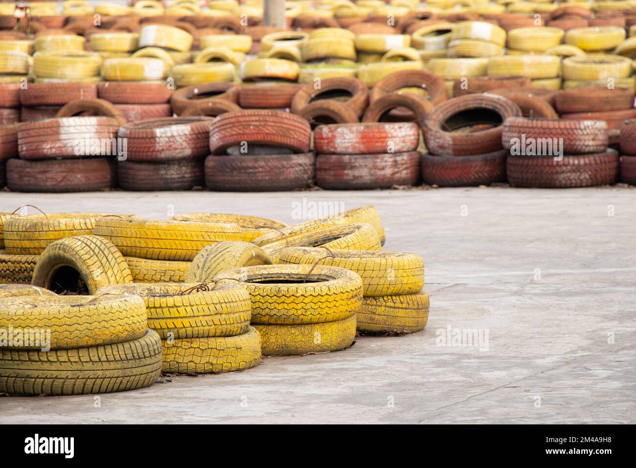 old tires at the racetrack in the afternoon in the park Stock Photo - Alamy