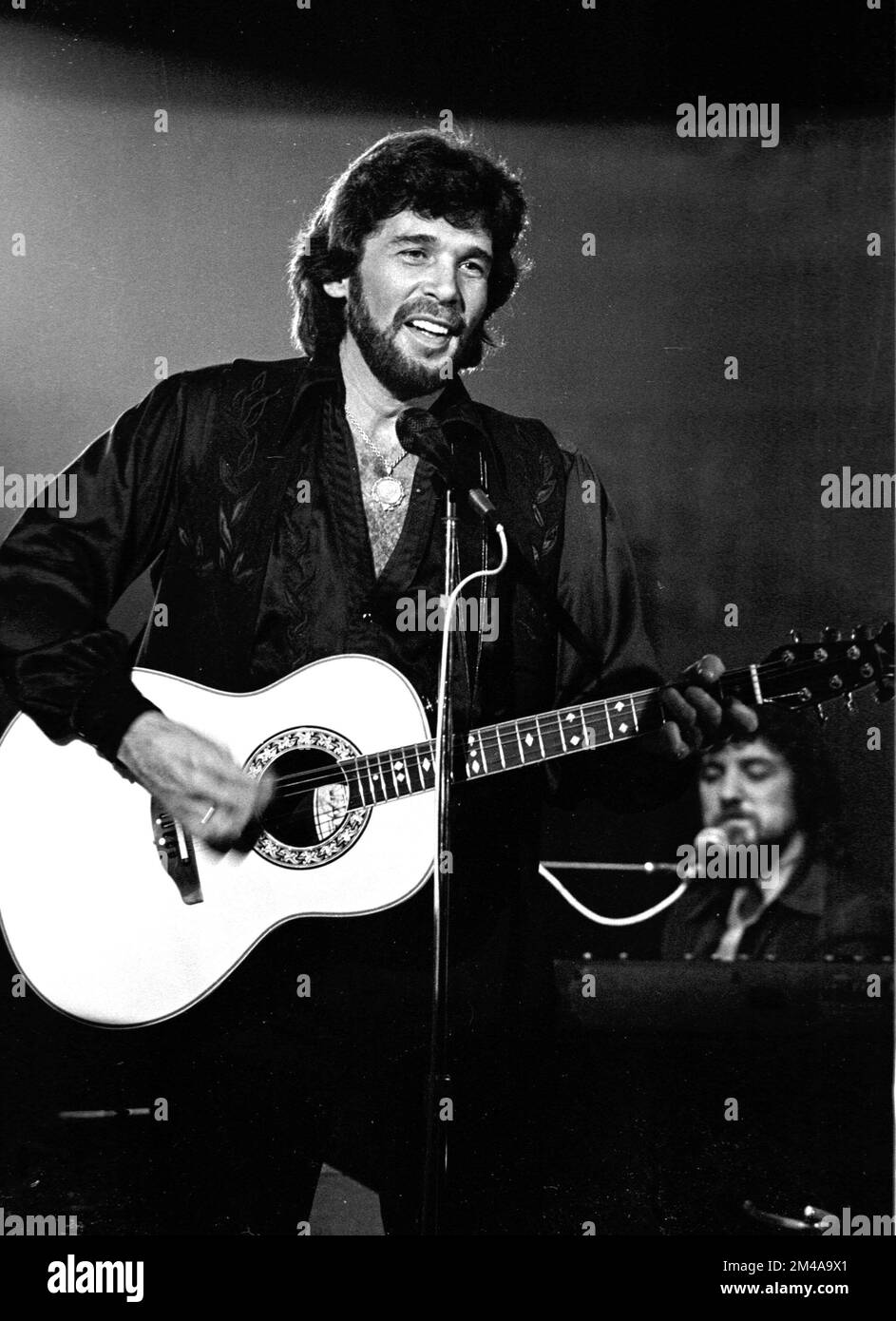 Eddie Rabbit performing on the TV Show "Solid Gold" at KTLA Studios in ...