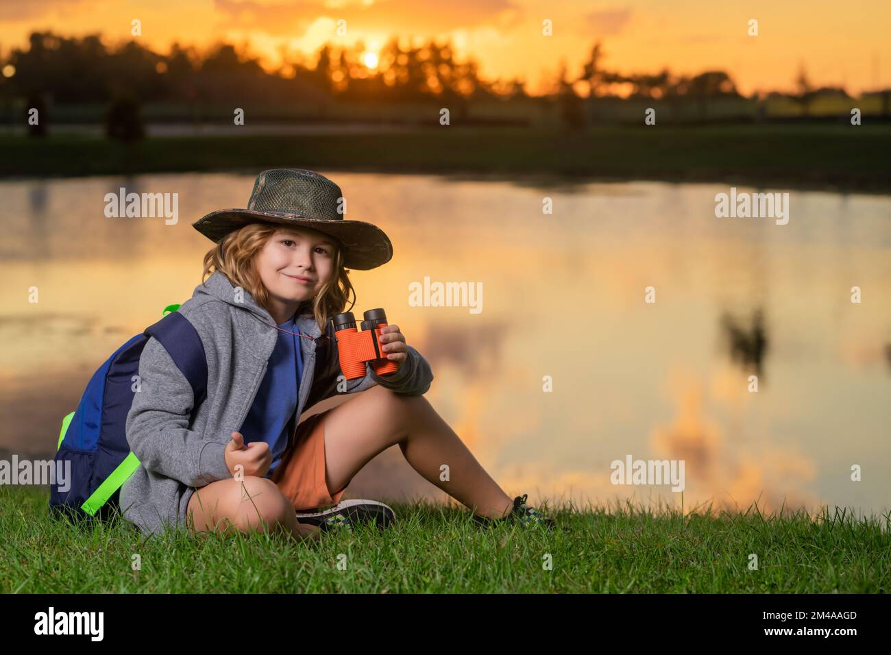 Child discovery concept. Summer holiday. Child with backpack, traveller ...