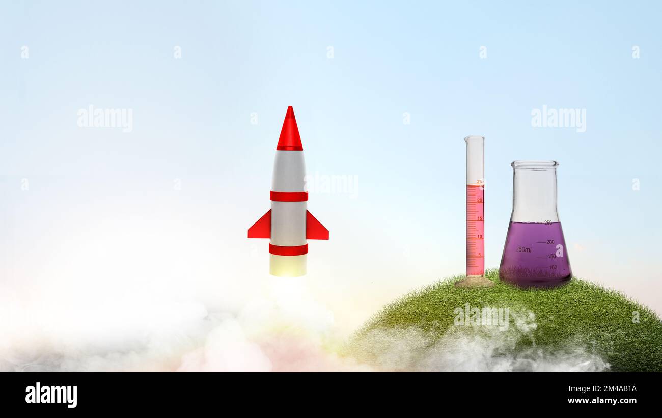 Colorful chemicals in laboratory glassware with a flying rocket on a ...