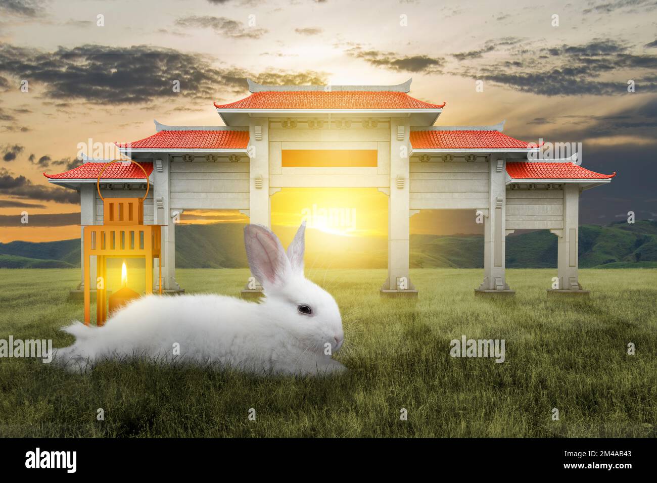 Rabbit on the field with Chinese pavilion gate with red roof and sunset ...