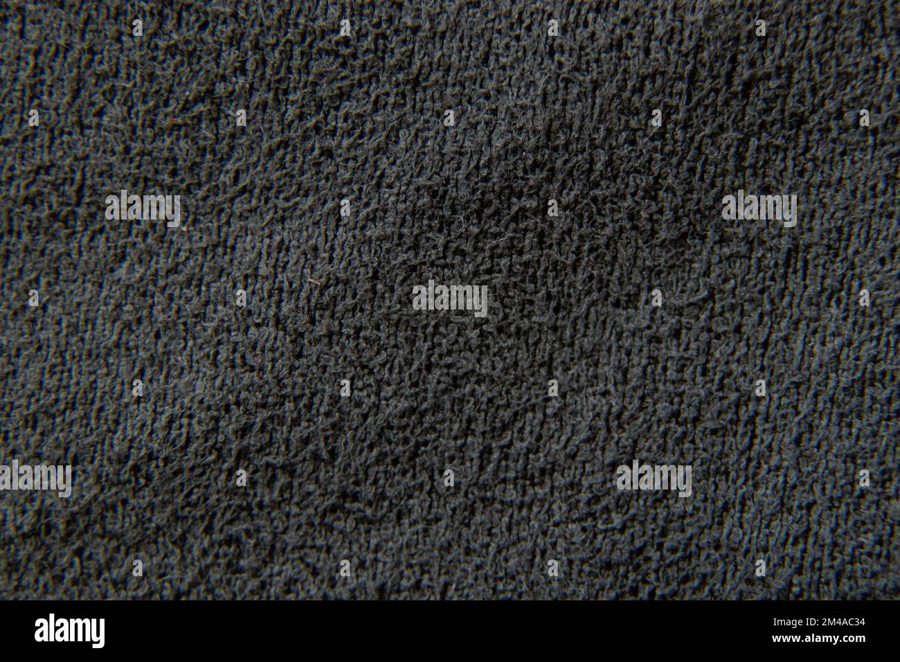 dark gray terry plain fabric as background macro Stock Photo - Alamy