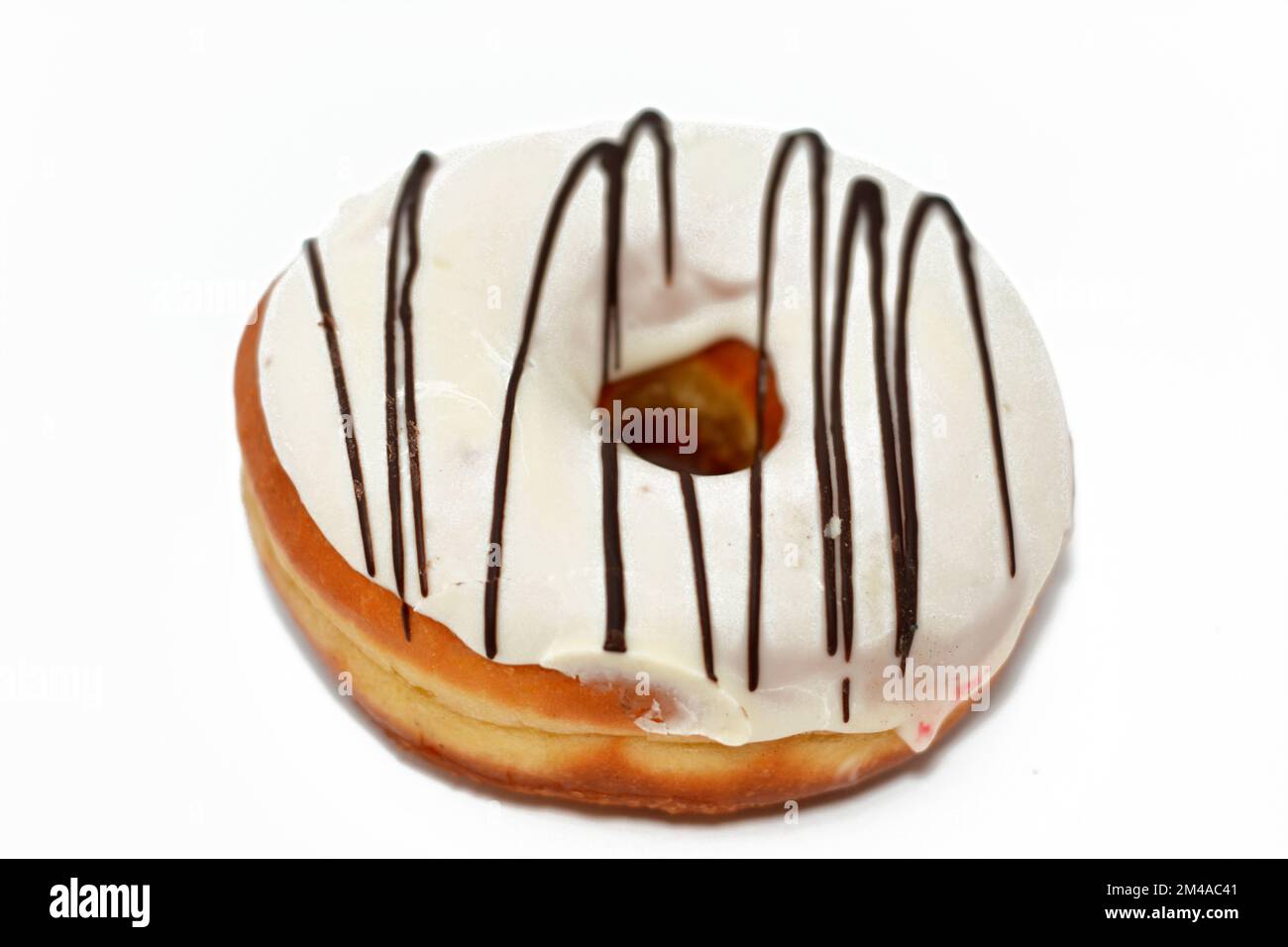 White chocolate ring donut with brown chocolate sauce, A glazed, yeast ...