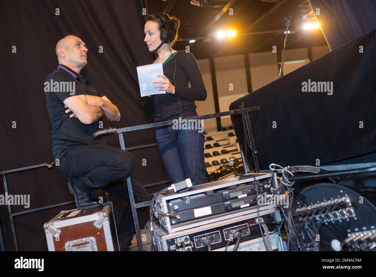 stage crew by sound equipment Stock Photo - Alamy