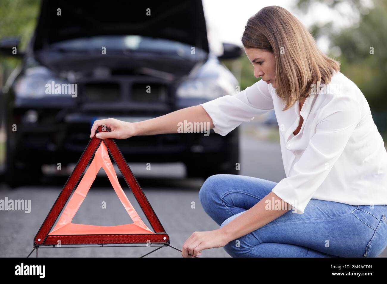 woman having a problem with a car Stock Photo - Alamy