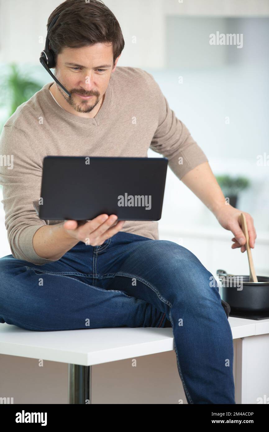 Working father multitasking from home hi-res stock photography and ...