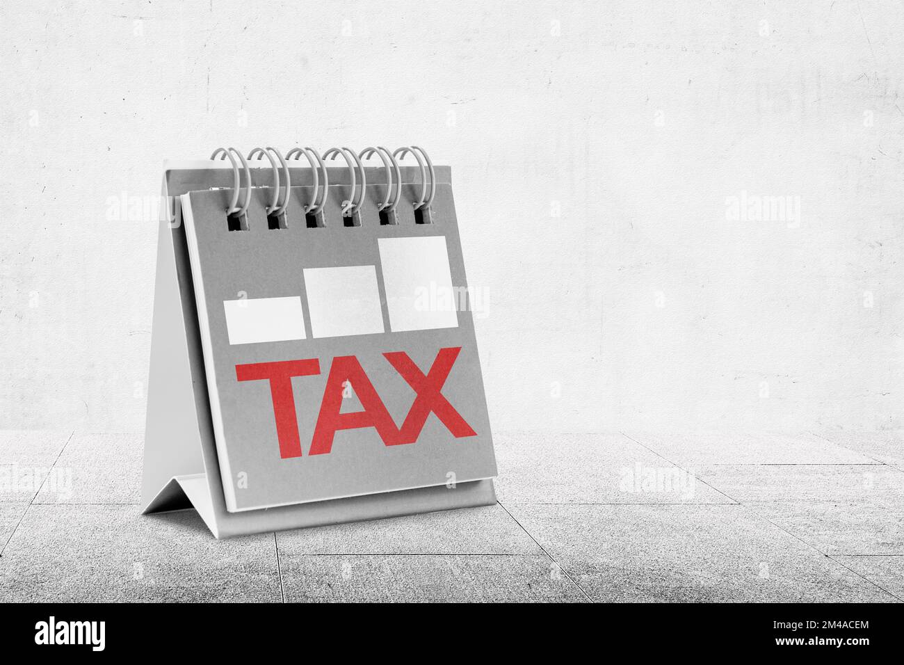 Calendar with graph and tax text on white background Stock Photo - Alamy