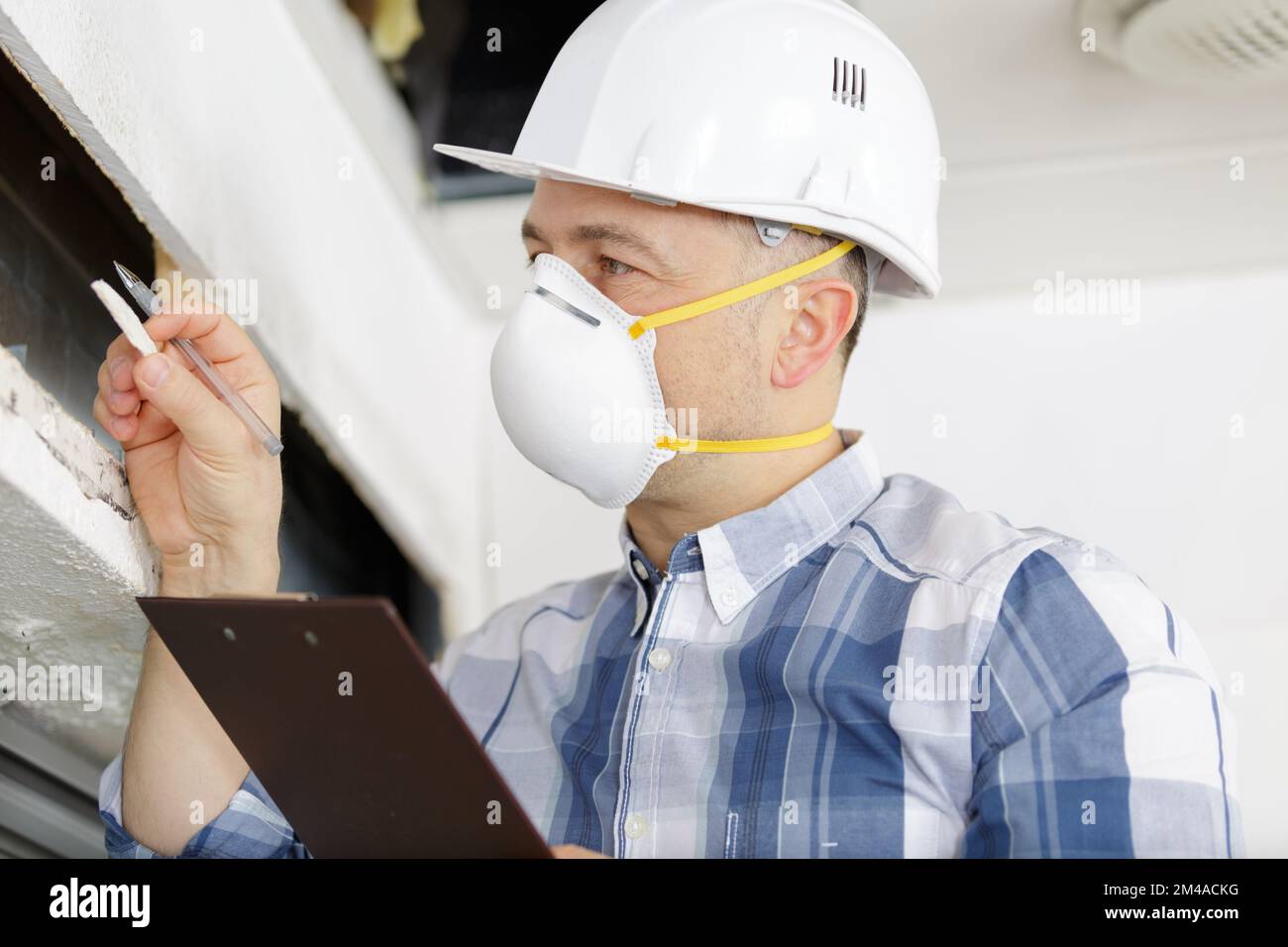 Inspecting a property hi-res stock photography and images - Alamy