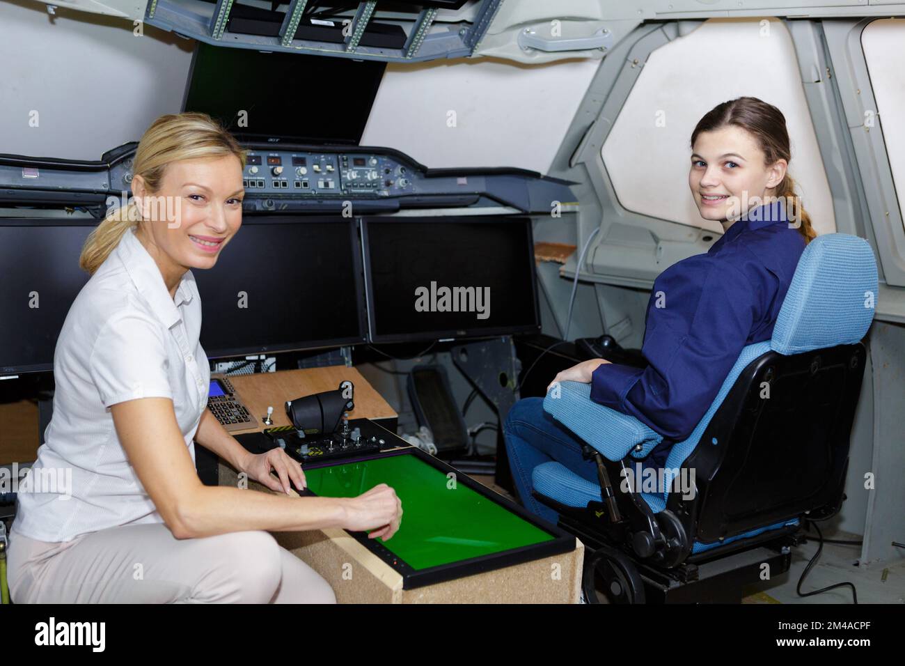 female apprentice with female teacher Stock Photo - Alamy