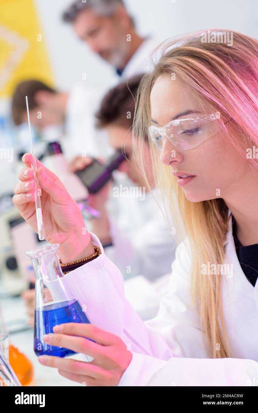a female lab student indoors Stock Photo - Alamy