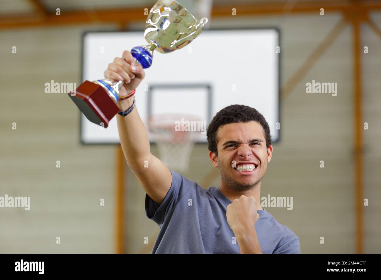 man super happy with trophy Stock Photo - Alamy