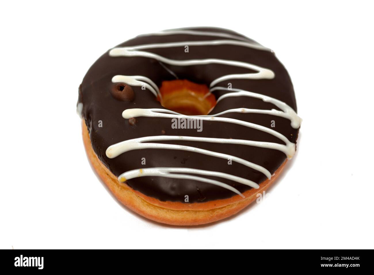 Brown chocolate ring donut with white chocolate sauce, A glazed, yeast ...
