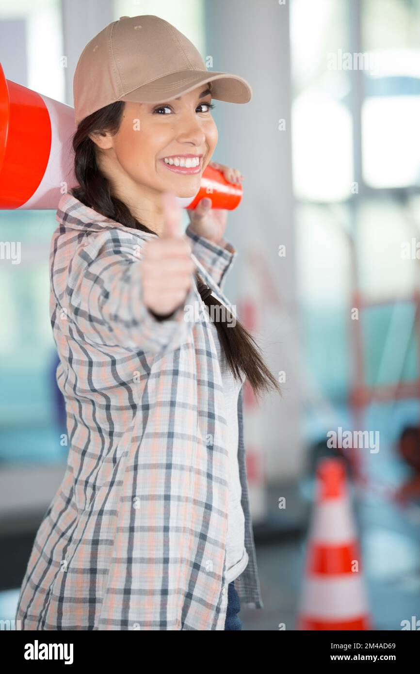 woman with a traffic cone Stock Photo - Alamy