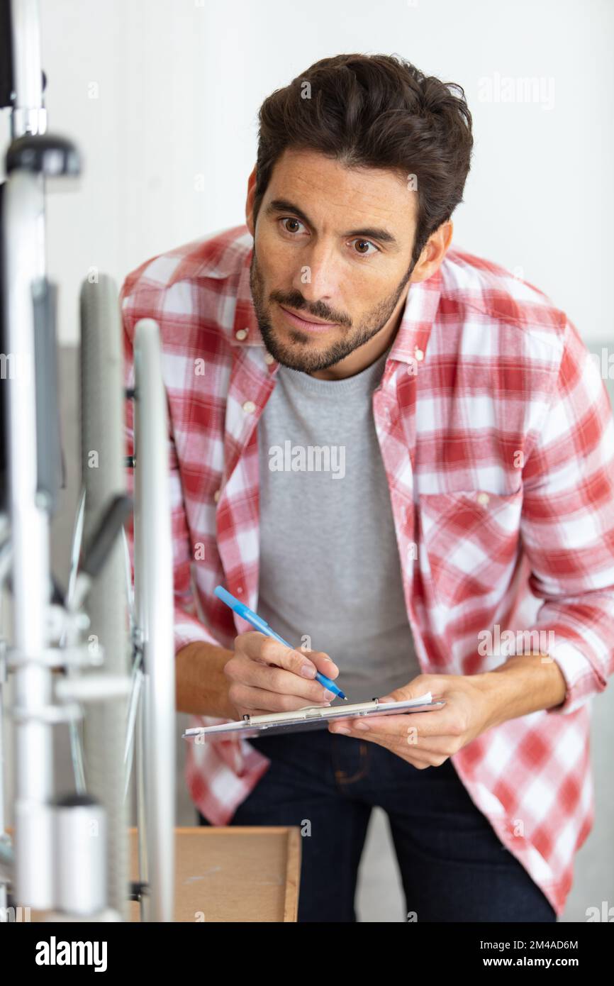Serious young support engineer hi-res stock photography and images - Alamy