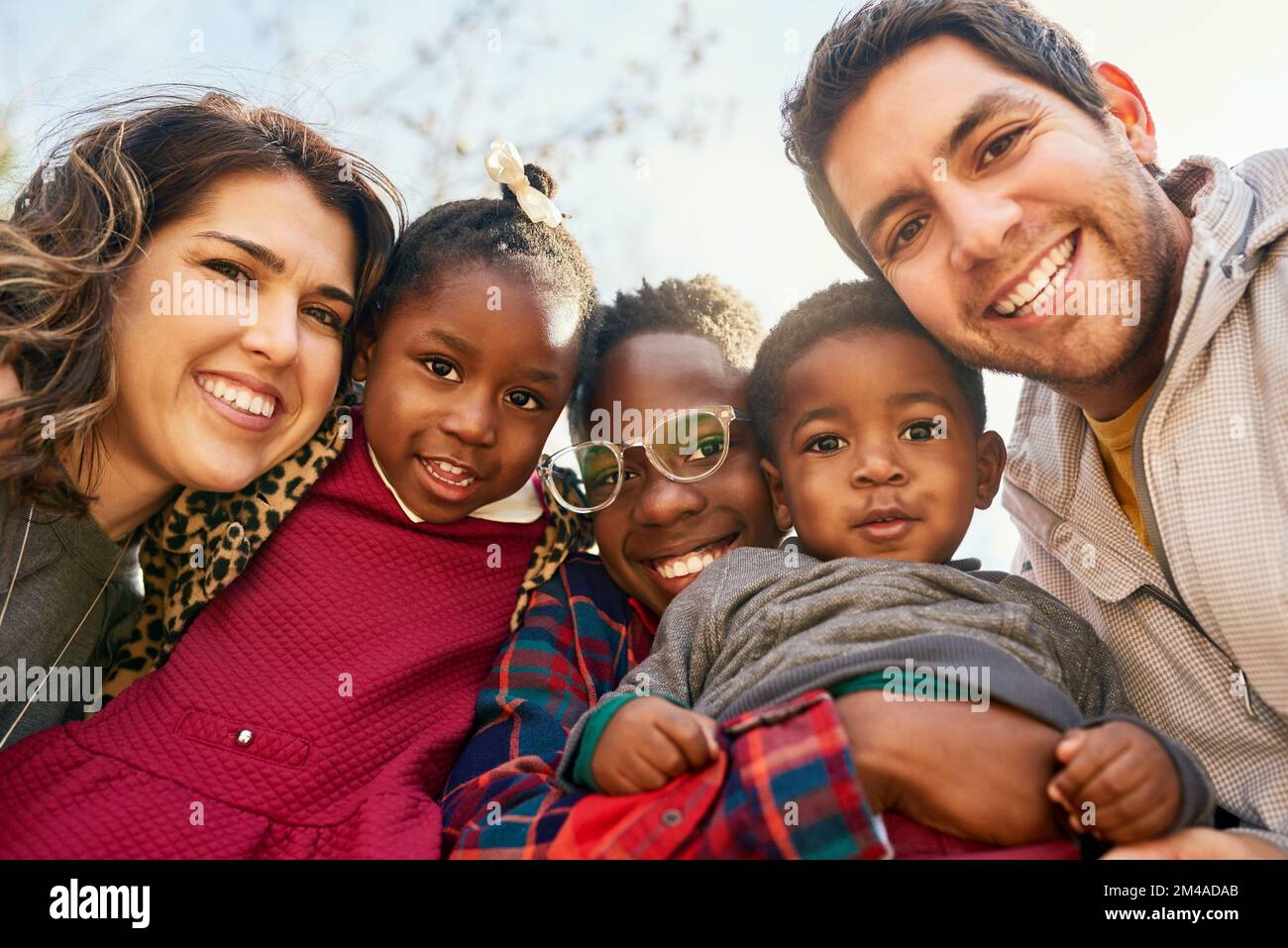 Love and family is the same word to us. Portrait of a happy family ...
