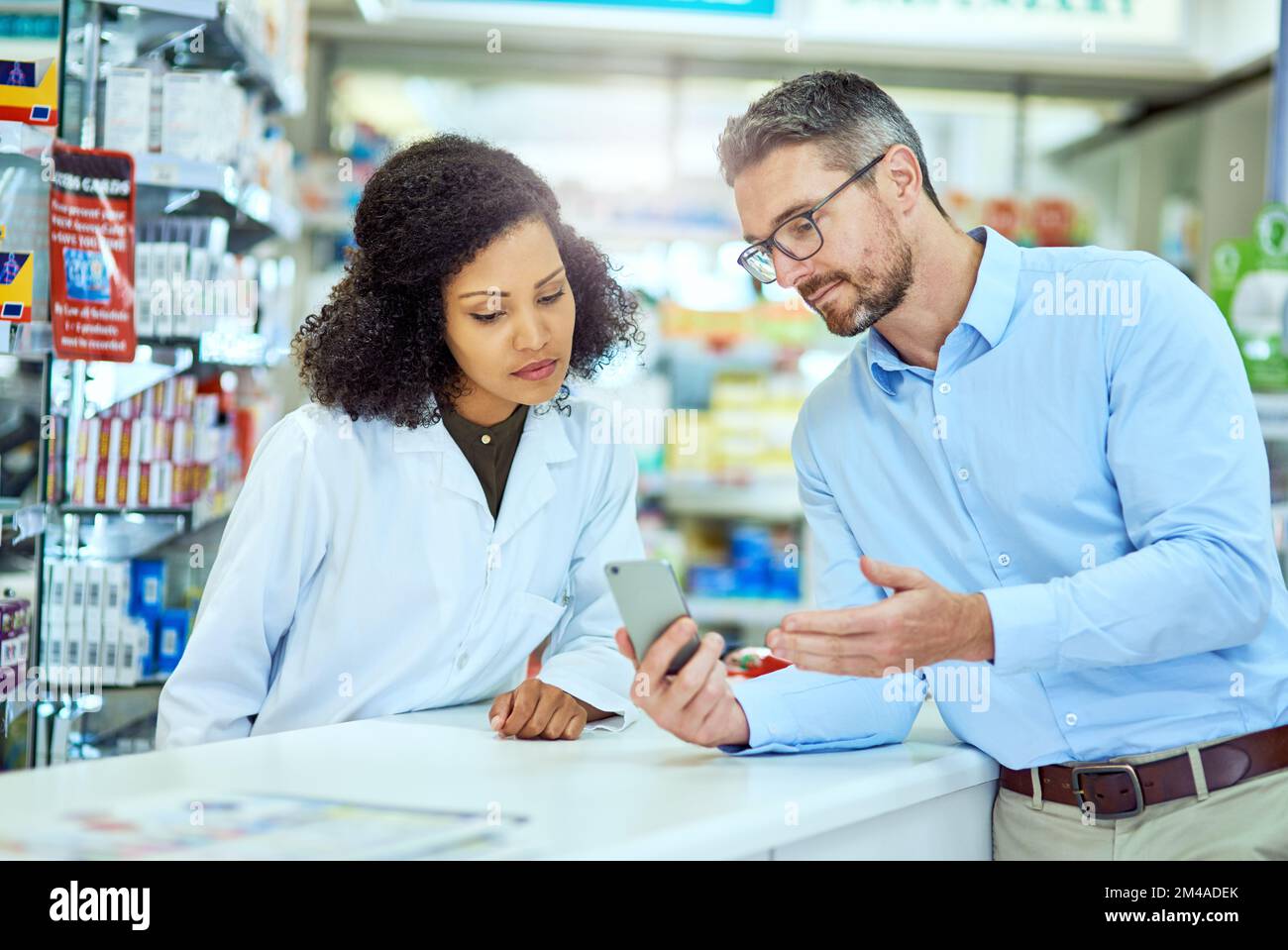 I have a picture of it...an attractive young female pharmacist helping ...