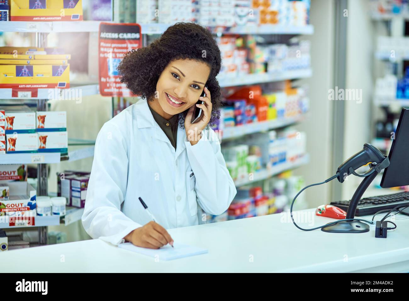 Taking orders over the phone. Cropped portrait of an attractive young ...
