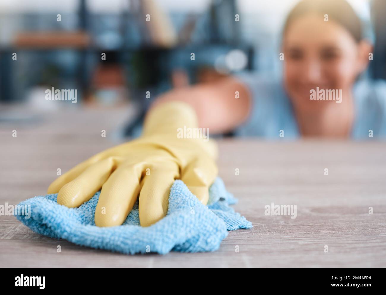 Hand, woman and table cleaning for hygiene, housework and household ...