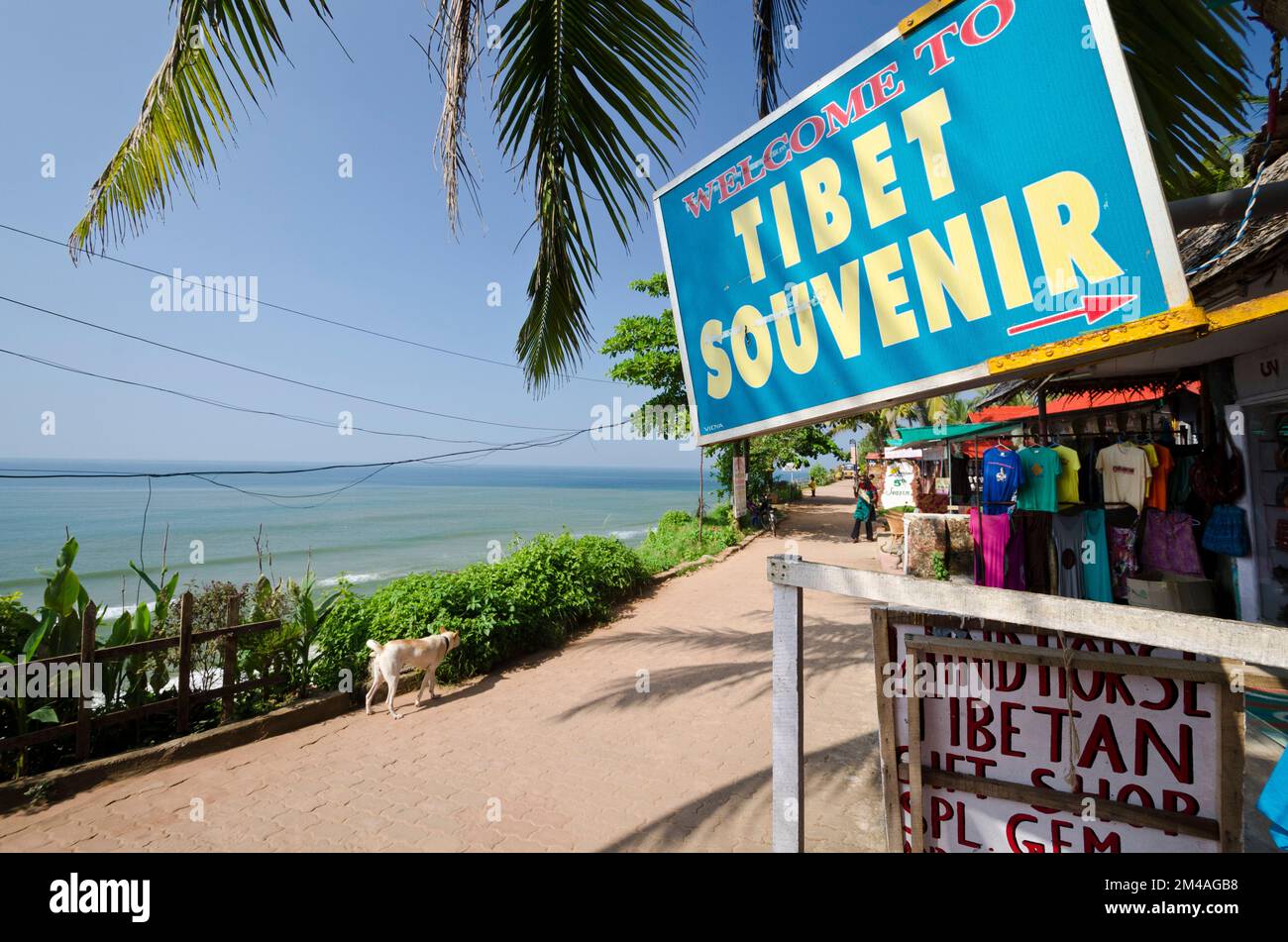 On top of the cliff above the beach of Varkala many shops and ...