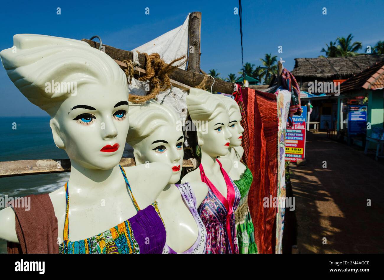 On top of the cliff above the beach of Varkala many shops and ...