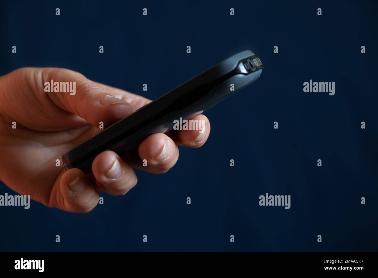 in the hands of a girl push-button old mobile phone close up Stock ...