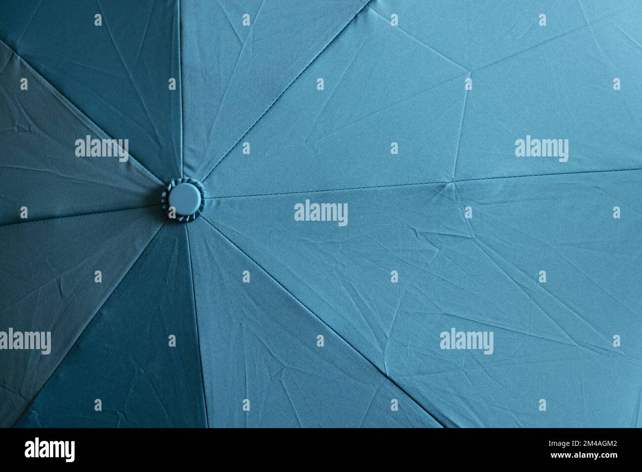 light blue umbrella as a background close up Stock Photo - Alamy
