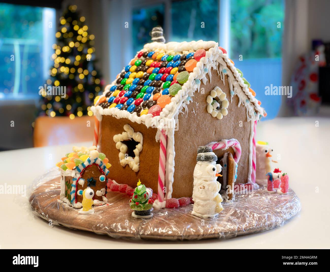 Close up of a homemade Ginger Bread House with Christmas characters and ...