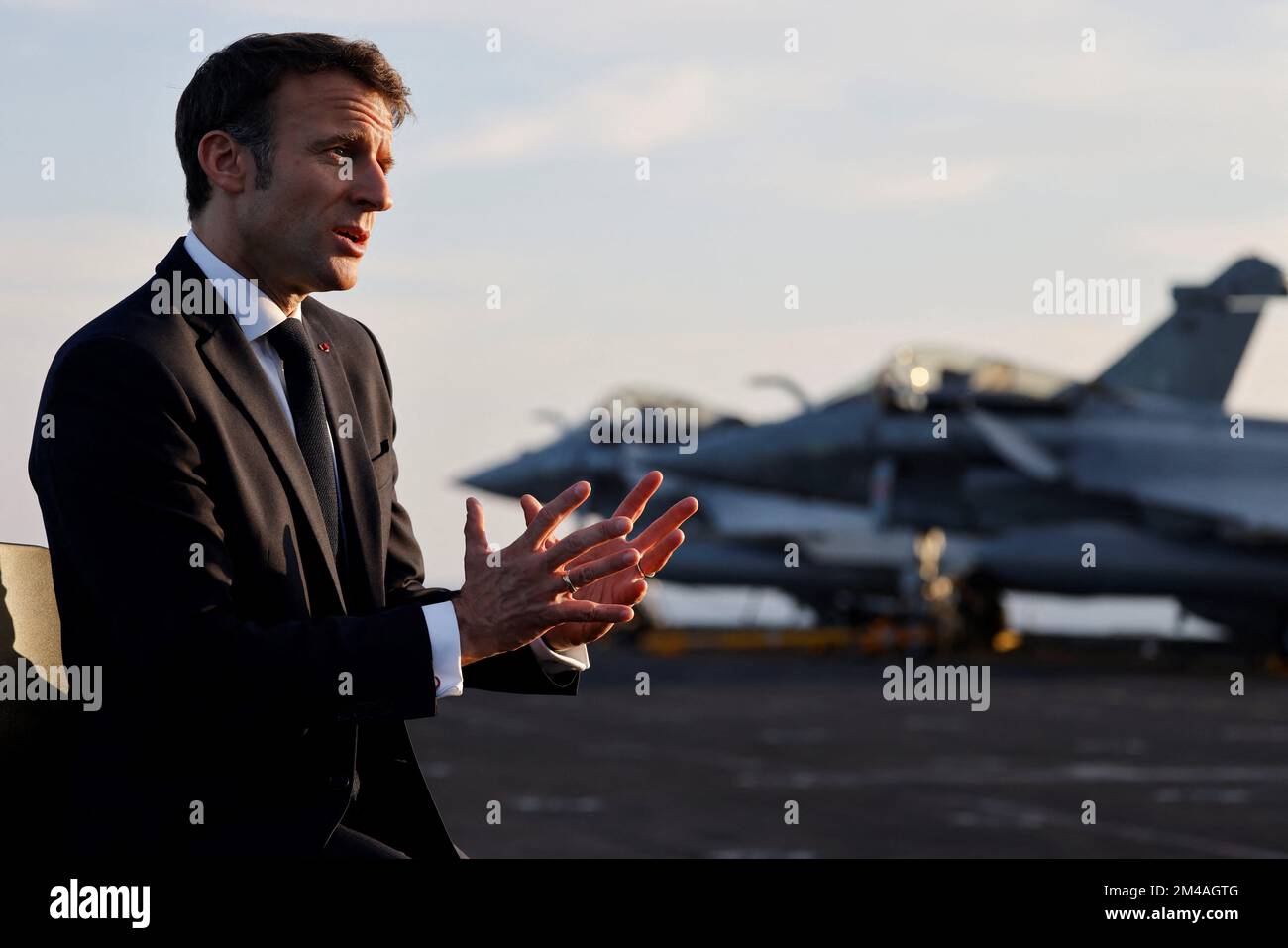 Rea Sea, December 19, 2022. - French President Emmanuel Macron gestures ...