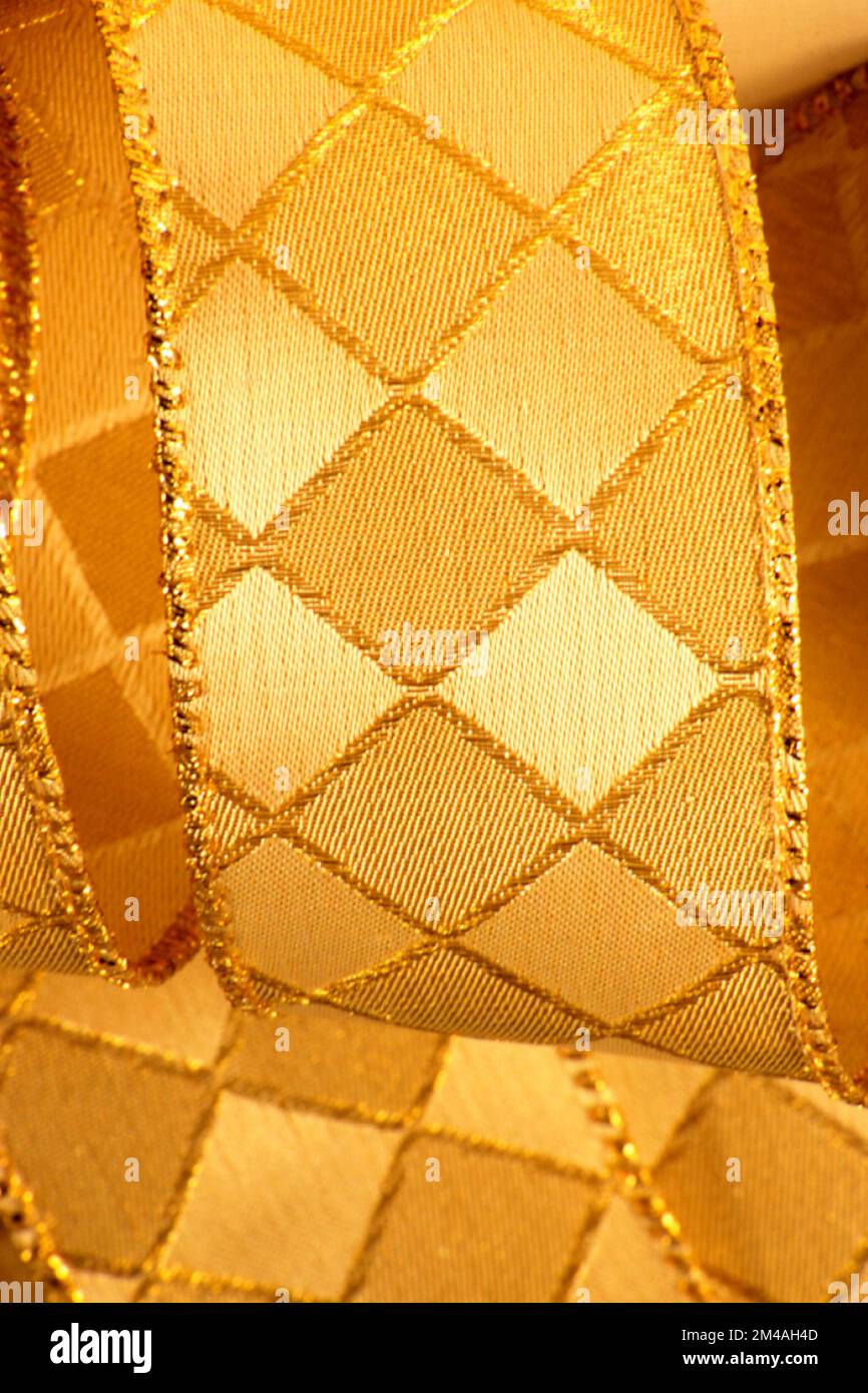 Golden festive ribbon example Stock Photo - Alamy