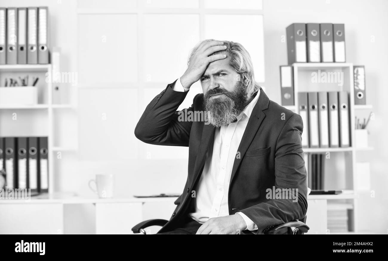 feeling terrible. bearded ceo in jacket has problem. confident man ...