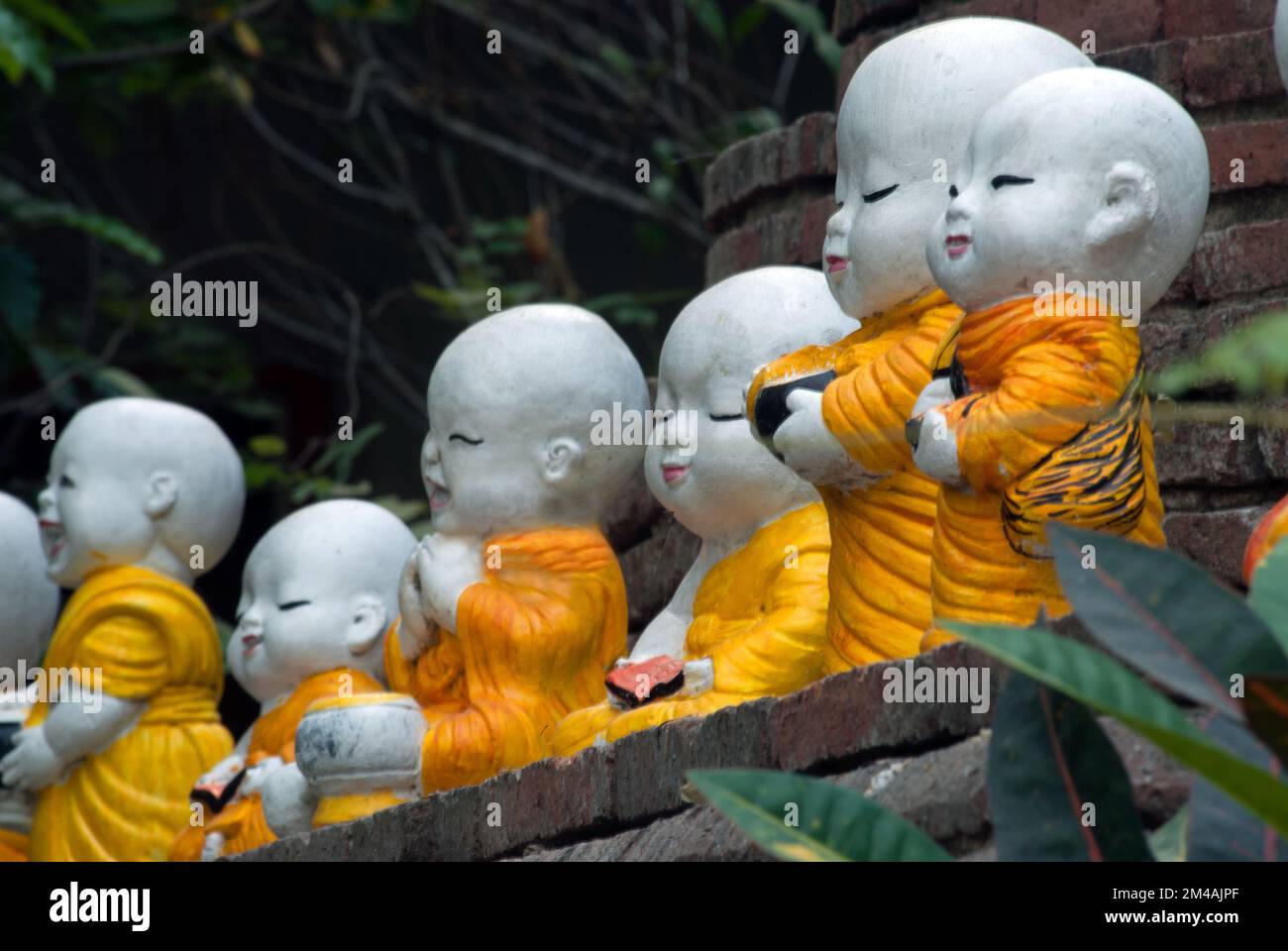 Sculpture monk doll in Thai temple Stock Photo - Alamy