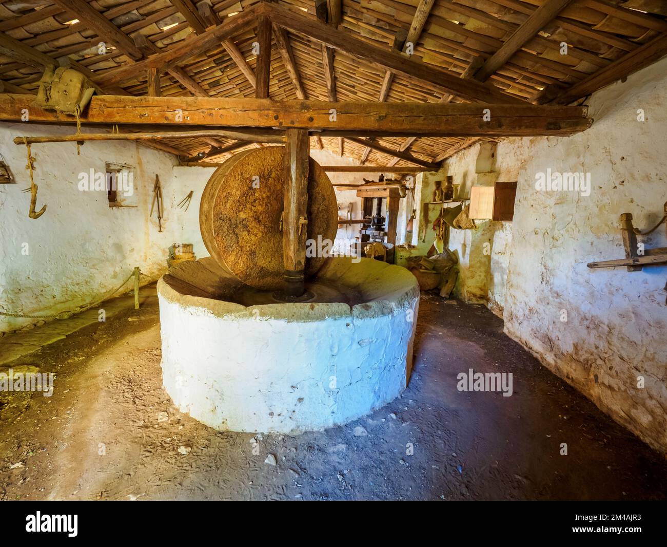Oil crusher - Open-air museum at the Scurati Caves or “Grotta ...