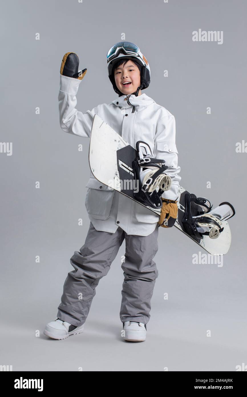 Boy asian snowboarding hi-res stock photography and images - Alamy