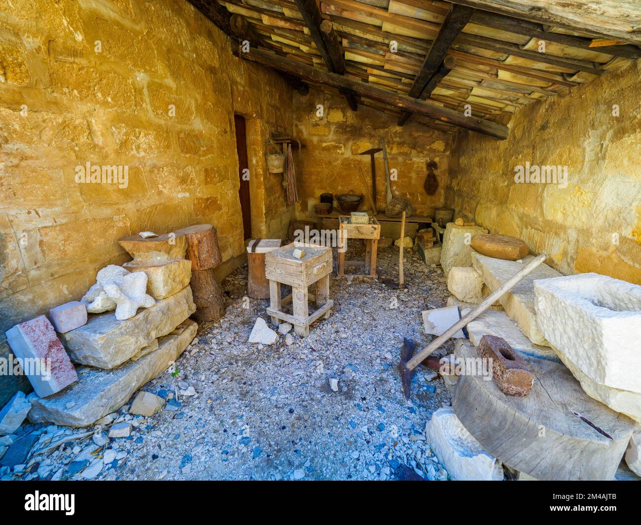 Stone-cutter - Open-air museum at the Scurati Caves or “Grotta ...