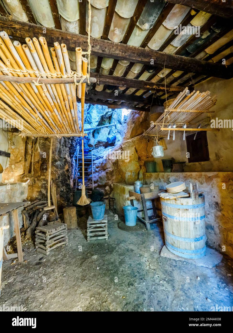 Open-air museum at the Scurati Caves or “Grotta Mangiapane” an ancient ...