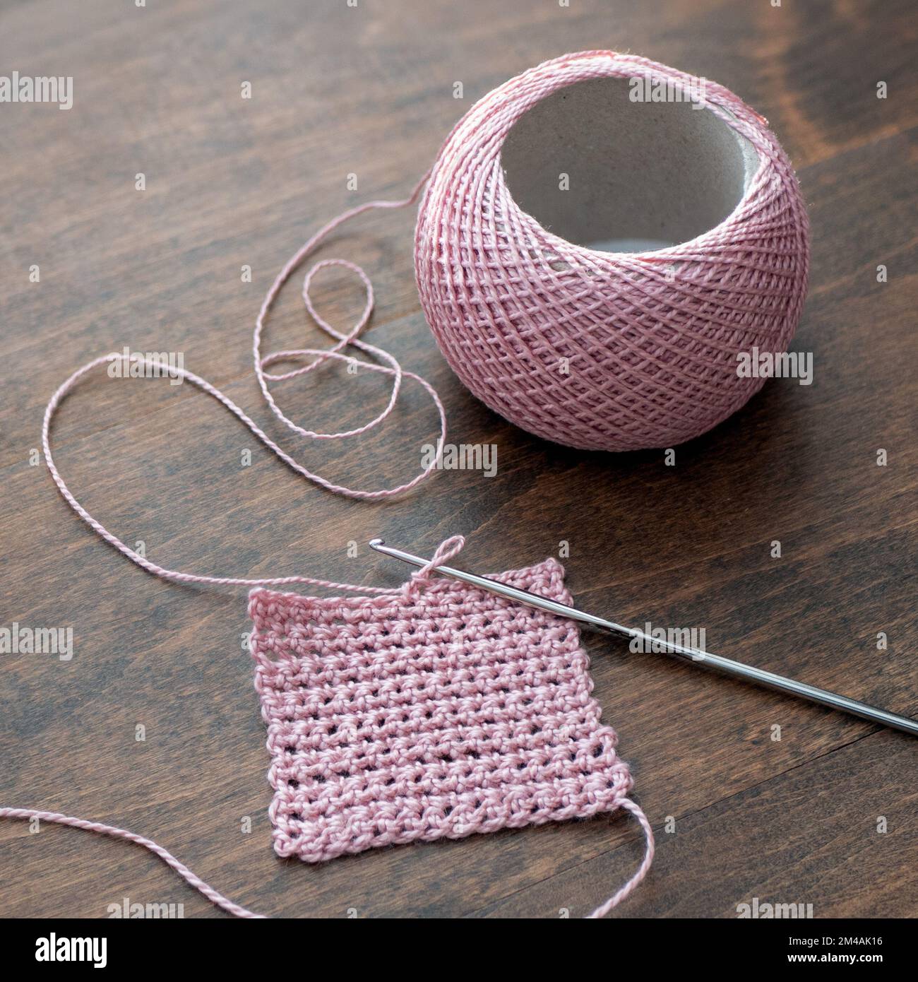 Getting started with crocheting, selective focus. Working with thread ...