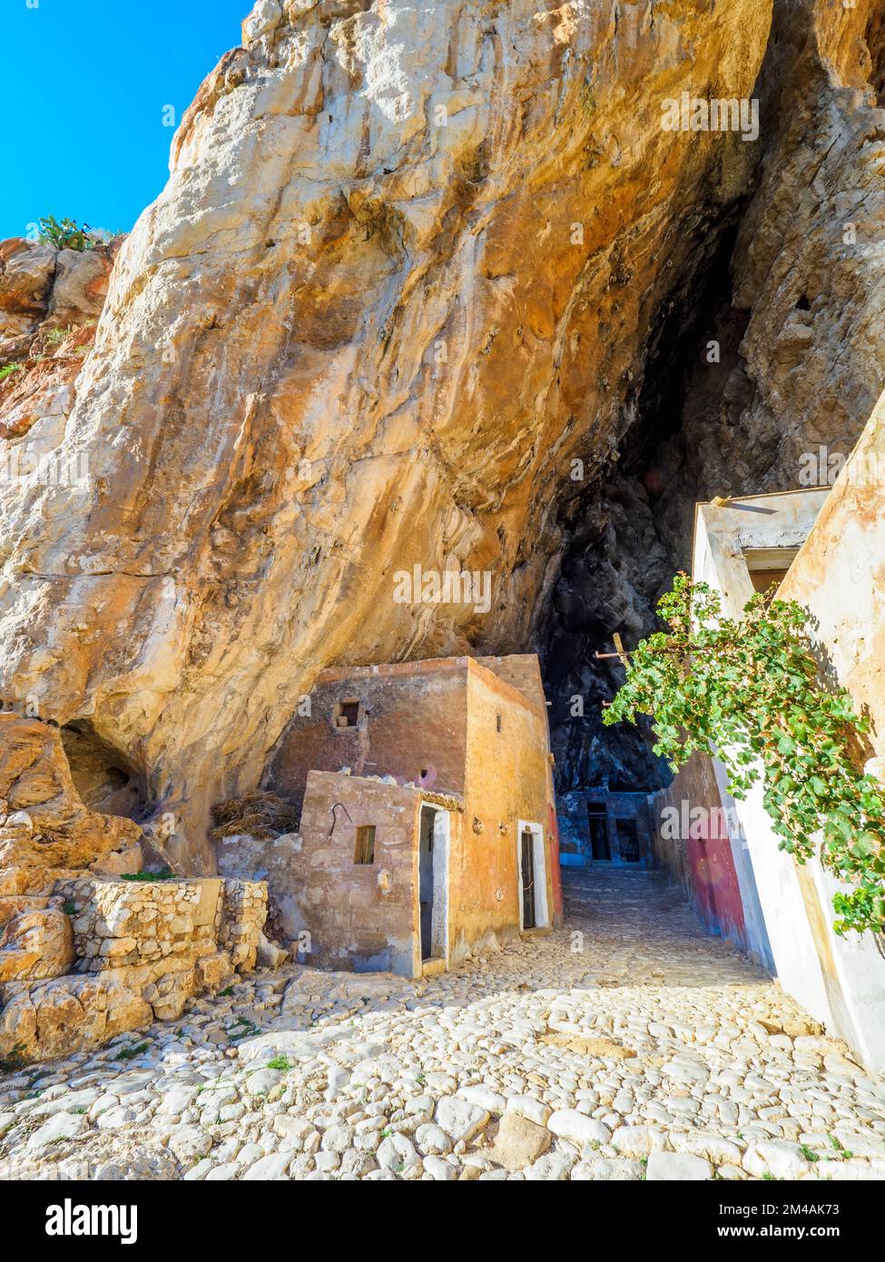 Open-air museum at the Scurati Caves or “Grotta Mangiapane” an ancient ...