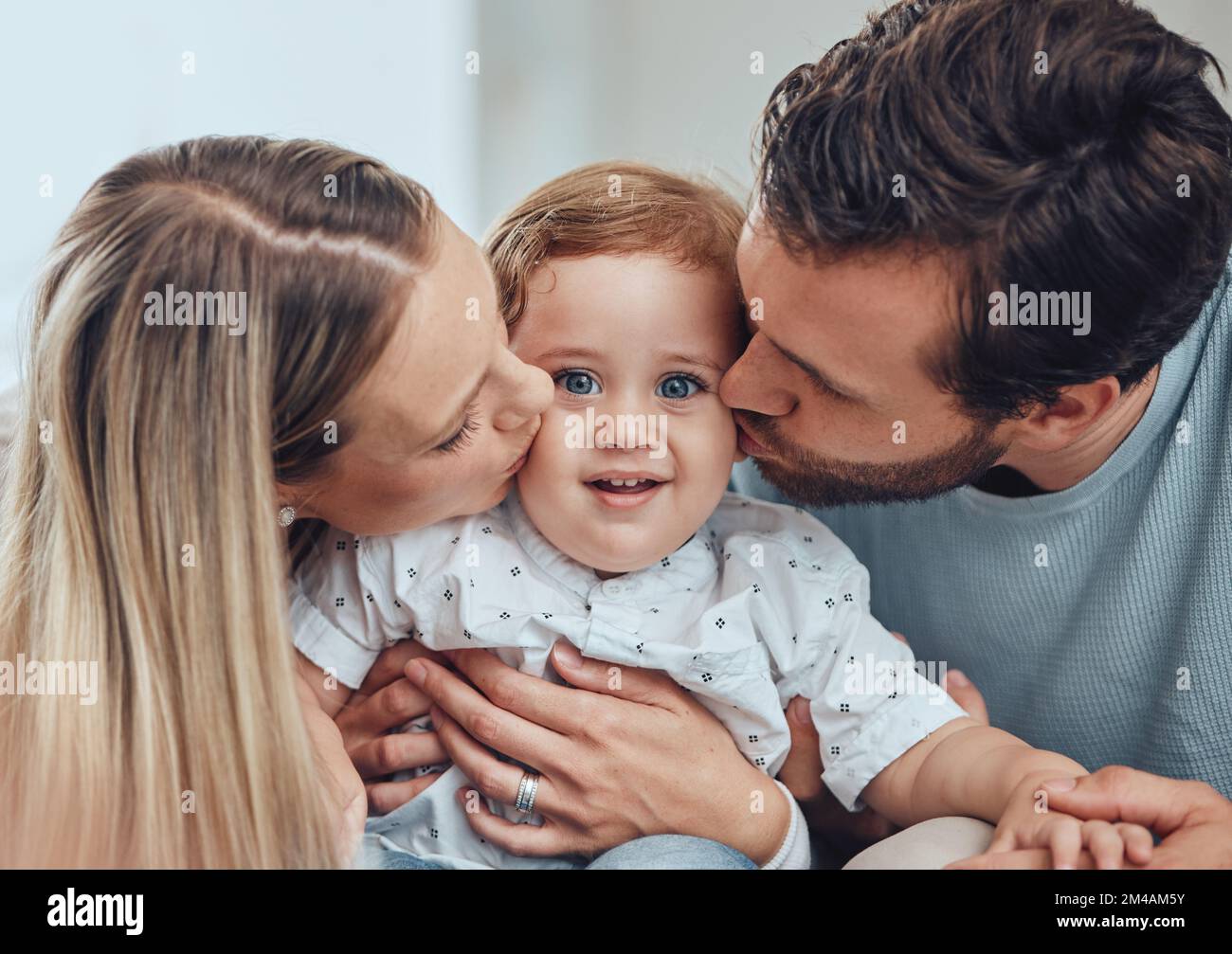 Parents, home and baby face kiss portrait of a mother, dad and child at ...