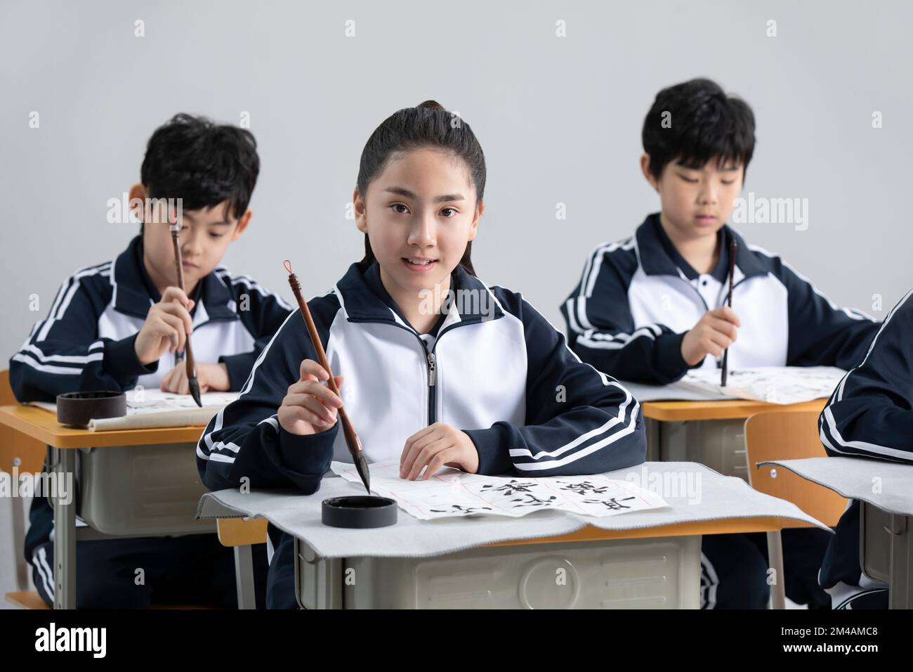 Calligraphy chinese child hi-res stock photography and images - Alamy