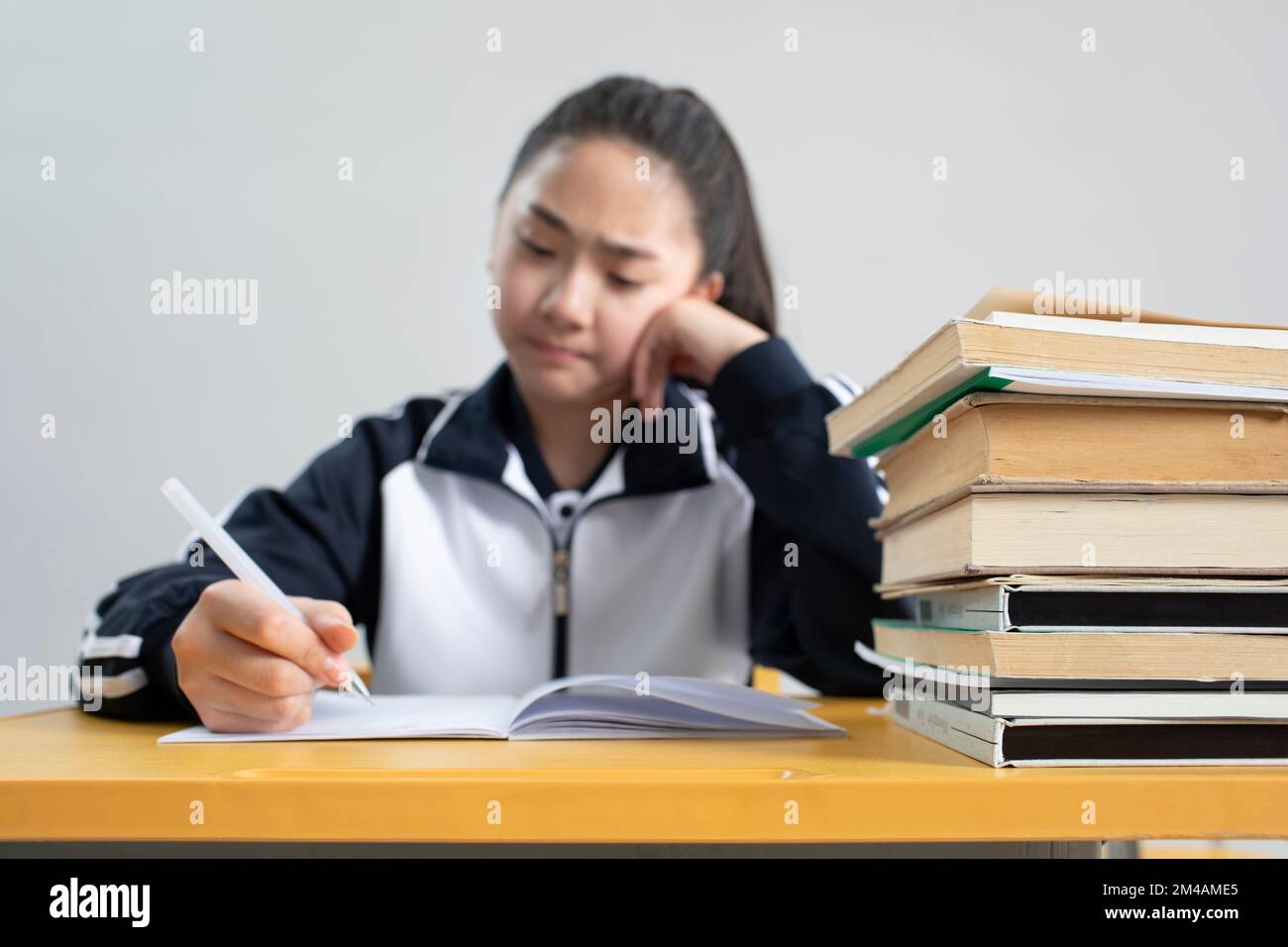 Chinese student learning in classroom Stock Photo - Alamy