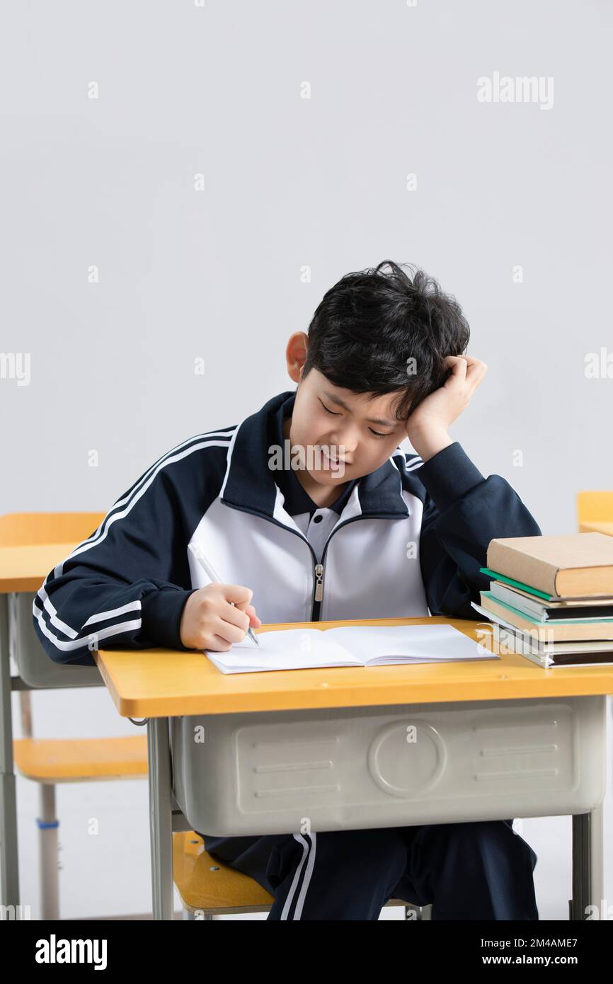 Chinese student learning in classroom Stock Photo - Alamy