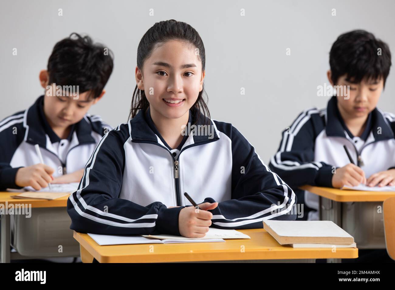 Chinese students learning in classroom Stock Photo - Alamy